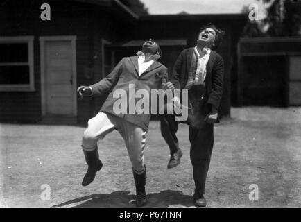 Actor Charlie Chaplin laughing Stock Photo - Alamy
