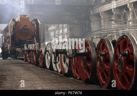 The driving wheels for QJ Class 2-10-2s in the erecting shop at Datong ...