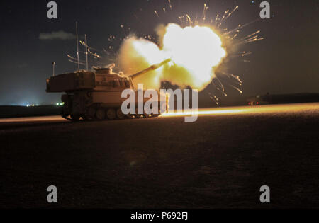A Paladin M109 Alpha-6 Howitzer, fires an illumination round during a ...