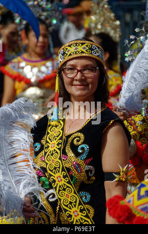 Iban woman in traditional costume in a traditional Iban house at the ...