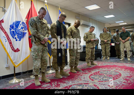 Division Chaplain (Lt. Col.) David Bowlus hugs his son Andrew, while ...