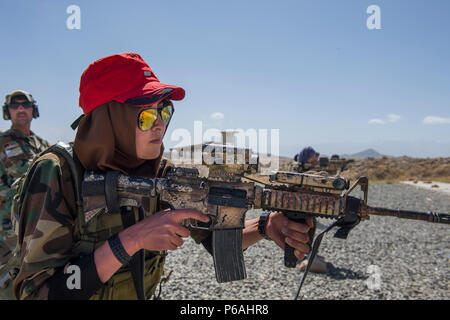 A Ktah Khas Afghan Female Tactical Platoon member participates in a ...
