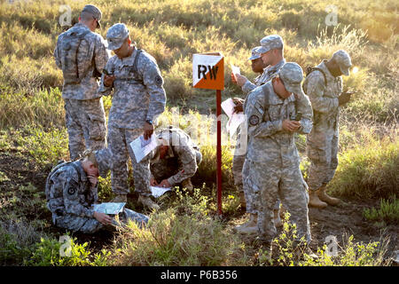 A student from GTMO’s first Army Basic Leadership Course plots his grid ...