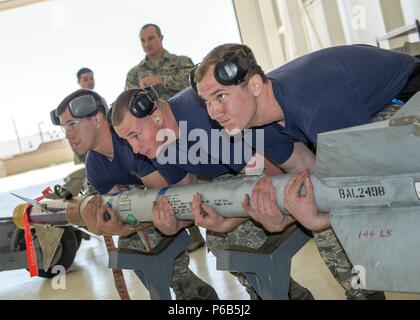 Senior Airman Caleb, a 54th Fighter Group weapons load crew member from ...