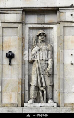 Socialist relief, Constitution Square, Warsaw, Poland. Post-war Social ...