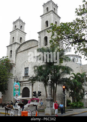 Mexico, Yucatan, Merida, Cathedral. Carriage with tourists Stock Photo ...