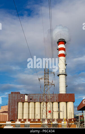 view of a factory chimney with smoke releasing Stock Photo - Alamy