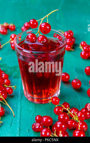 Currant juice in glass on white Stock Photo - Alamy
