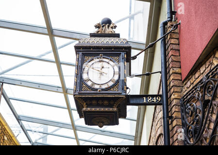 Stables Market clock and Camden Lock sign detail, Camden Market, London ...