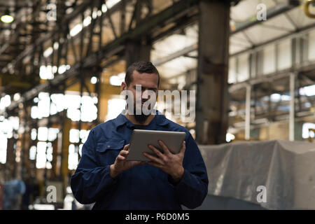 male technician using digital tablet Stock Photo - Alamy