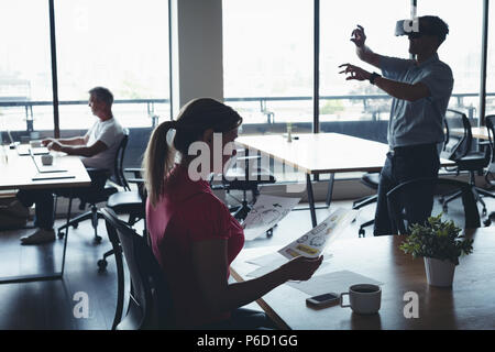 startup Business team using virtual reality headset in night office ...