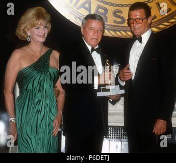 Barbara Sinatra Frank Sinatra Roger Moore at the Friars Club 'Man of ...