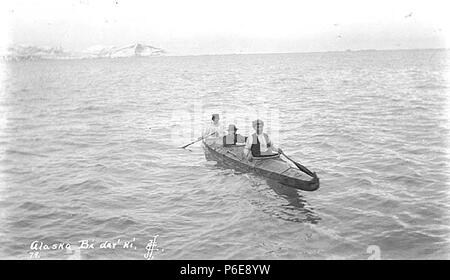Three natives in bidarki, or skin covered boat on Cold Bay, ca 1912 ...