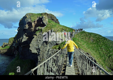 Rope bridge between two cliffs Stock Photo - Alamy