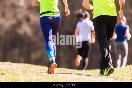Marathon running race, people feet on city road Stock Photo - Alamy