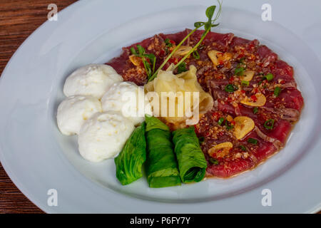 Raw Japanese young Beef carpaccio Stock Photo - Alamy