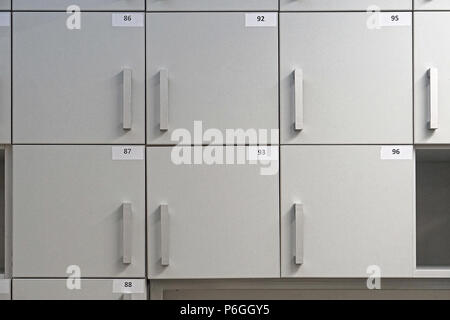 Small lockers storage compartments with numbers Stock Photo - Alamy