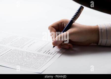 Close up of business man signing contract making a deal, business ...