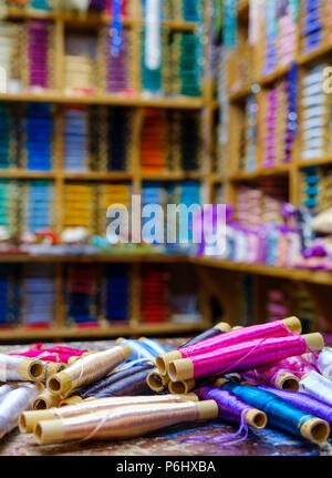 Spools of colorful silk thread Stock Photo - Alamy