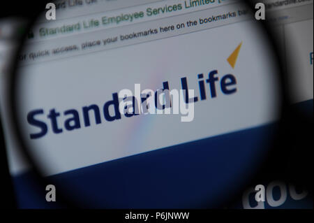 The Standard Life website seen through a magnifying glass Stock Photo ...