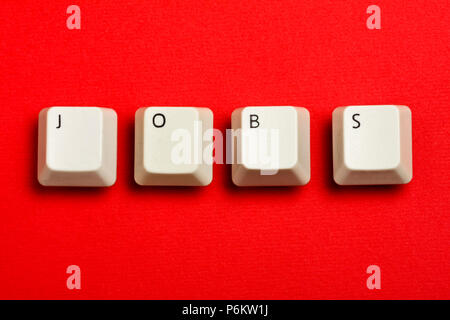 Word jobs formed with computer keyboard keys on white background with ...