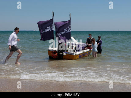 an Ice cream boat sells ice-cream to tourists in very warm weather June ...