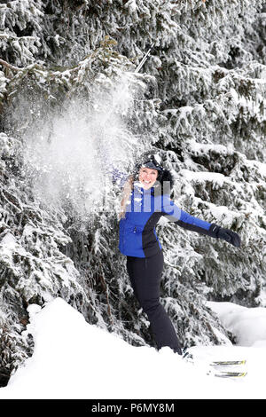 young woman is skiing at a ski resort Stock Photo - Alamy