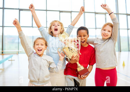 Kids Winning Sports Competition. Children Soccer Team with Trophy. Boys ...