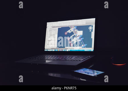 Computer screen illuminating a dark room at night Stock Photo - Alamy