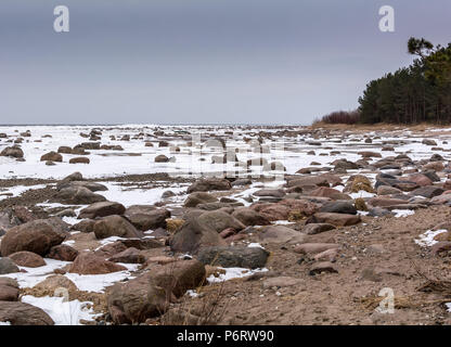 Snow on Baltic sea beach next to Liepaja, Latvia Stock Photo - Alamy