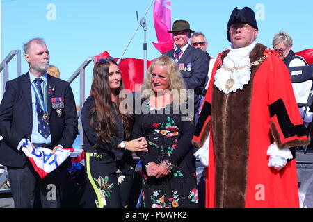 Mrs Marilyn Linton, widow of the late Clive Linton is presented with ...