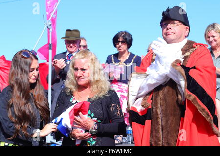 Mrs Marilyn Linton, widow of the late Clive Linton is presented with ...