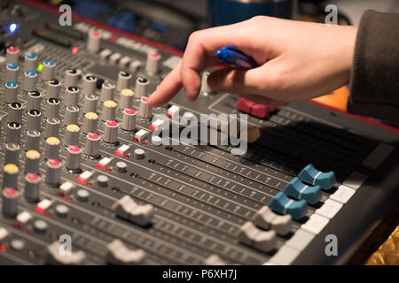 A sound mixing console for mixing audio signals in a recording studio ...