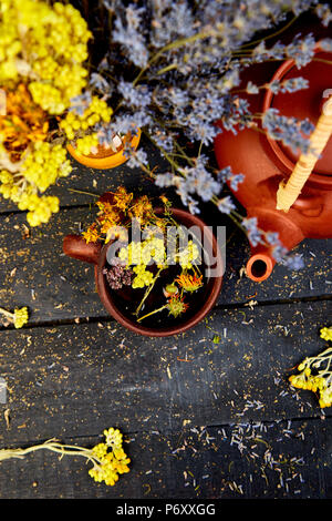 Cup of herbal tea - tutsan, sagebrush, oregano, helichrysum, lavender ...