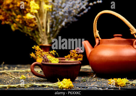 Cup of herbal tea - tutsan, sagebrush, oregano, helichrysum, lavender ...