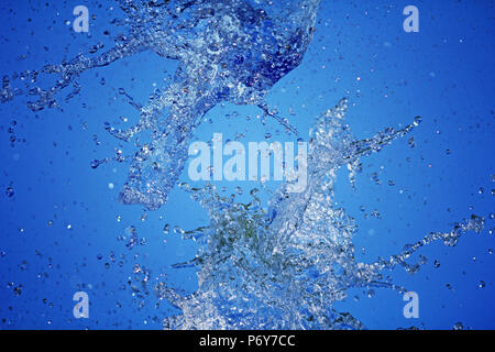 Blue splash closeup shoot, isolated on white background Stock Photo - Alamy