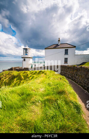 Blackhead path lighthouse, Whitehead, County Antrim, Ulster region ...
