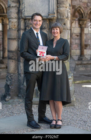 Dr Fiona Bradley, with her husband Nick Barley, after receiving her ...
