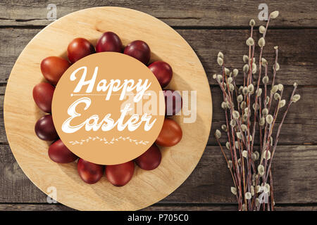 Inscription Happy Easter and catkins on rustic board, festive ...