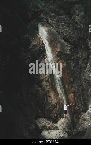 Man standing in front of a big round maze with flag Stock Photo - Alamy