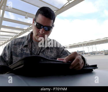 An Arizona National Guard Soldier performs push-ups during training for ...