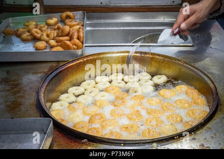 Lokma, Turkish street food dessert. Bites flavoured with honey, sugar ...