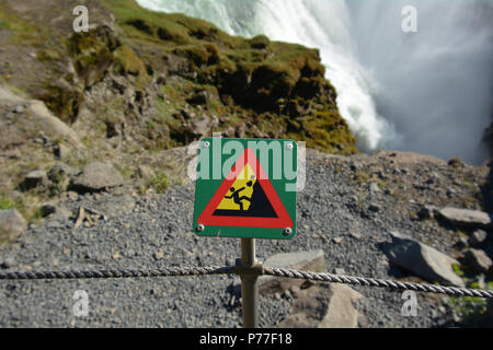 Warning sign at Gullfoss waterfall Stock Photo - Alamy