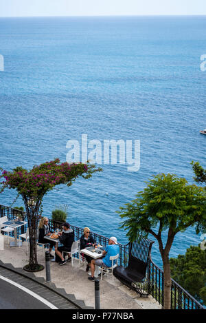 view down cliffside to coast and road in capri Stock Photo - Alamy