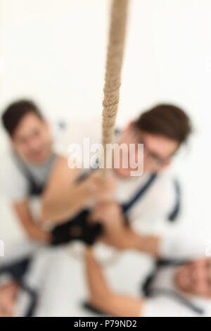 background image is a group of workers rising up Stock Photo - Alamy