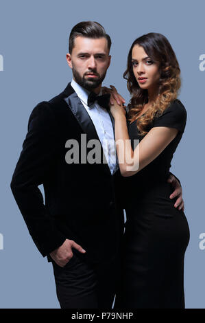 Business partners standing on a gray background Stock Photo - Alamy