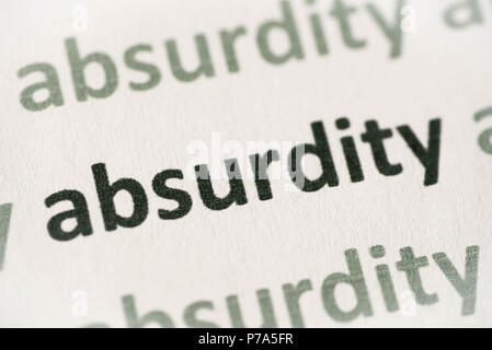 word absurd printed on white paper macro Stock Photo - Alamy