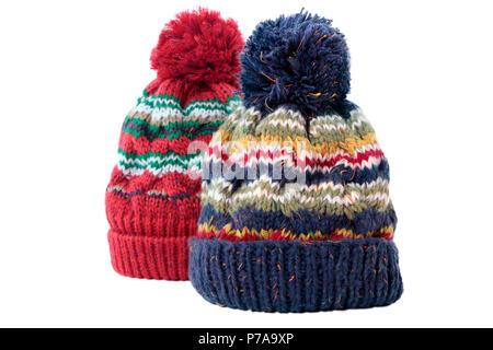 Two chunky knit bobble hats or knit hats isolated on a white background ...