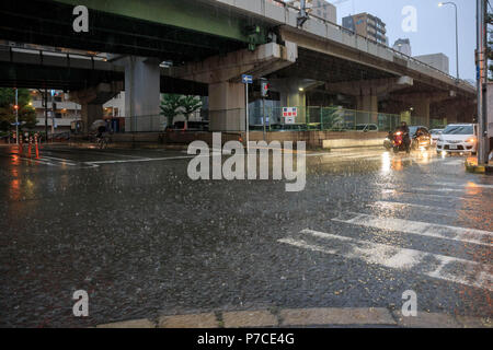 Osaka, Japan - July 5, 2018: Flooded crosswalk at intersection in Suita ...