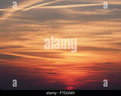Marvelous sun set with clouds formation seen from european city of ...